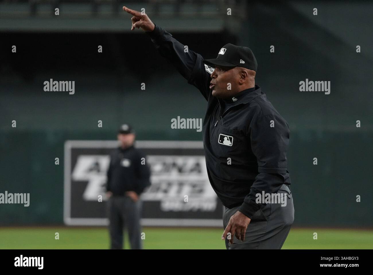 MLB umpire Laz Diaz (63) throws Arizona Diamondbacks manager Torey ...