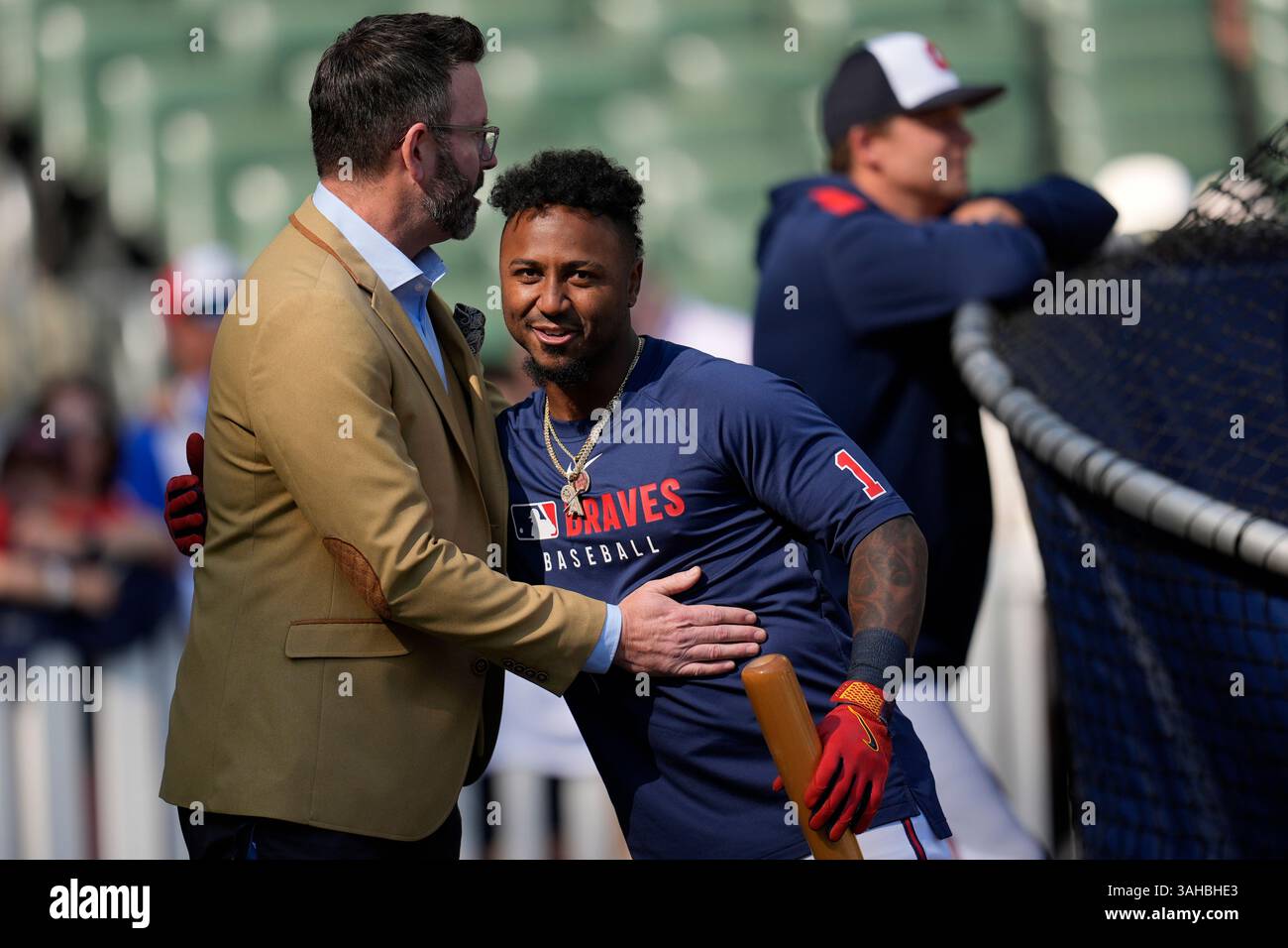 Former Atlanta Braves pitcher Peter Moylan speaks with Orlando Arcia ...