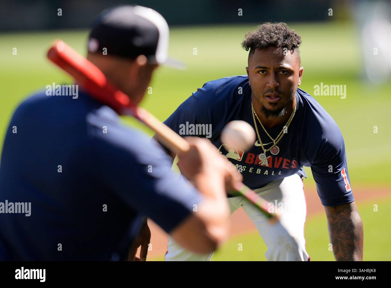 Atlanta Braves shortstop Orlando Arcia (11) warsm up before a baseball ...