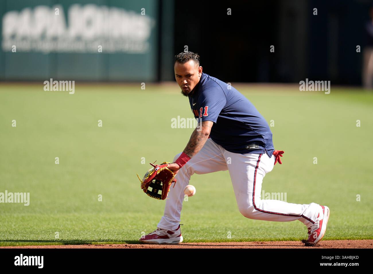Atlanta Braves shortstop Orlando Arcia warms up before a baseball game ...