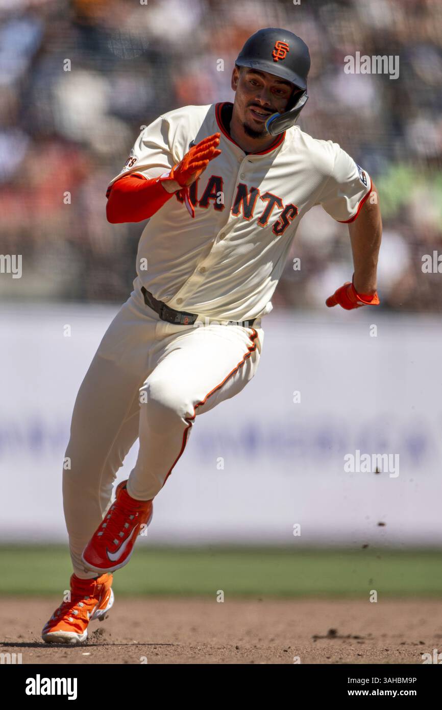 San Francisco Giants' Willy Adames rounds third base to score during ...