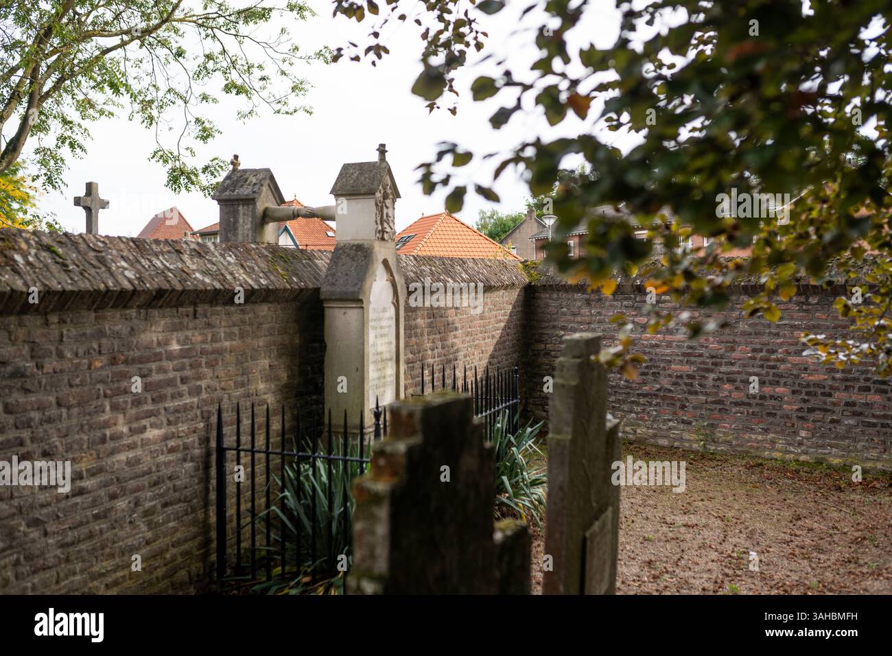 Monument of married couple with separate religions each at another side ...