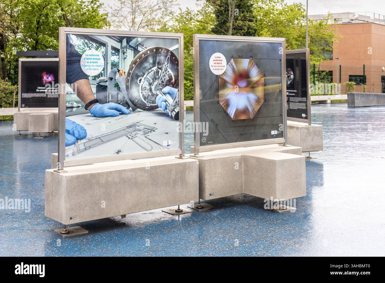 Outdoor exhibition panels at CERN showcase images of the Large Hadron ...