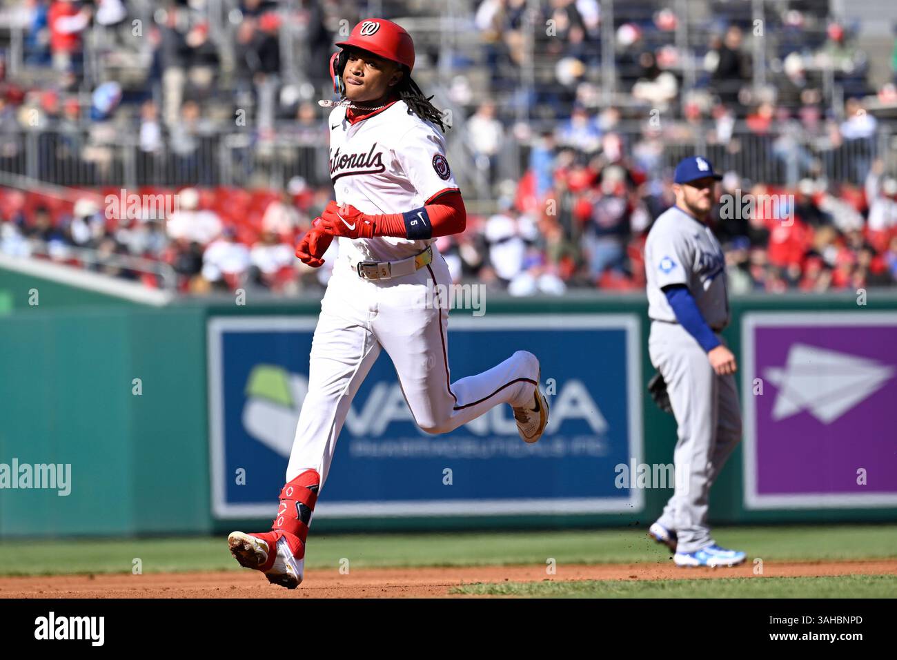 Washington Nationals' CJ Abrams runs the bases after hitting a solo ...
