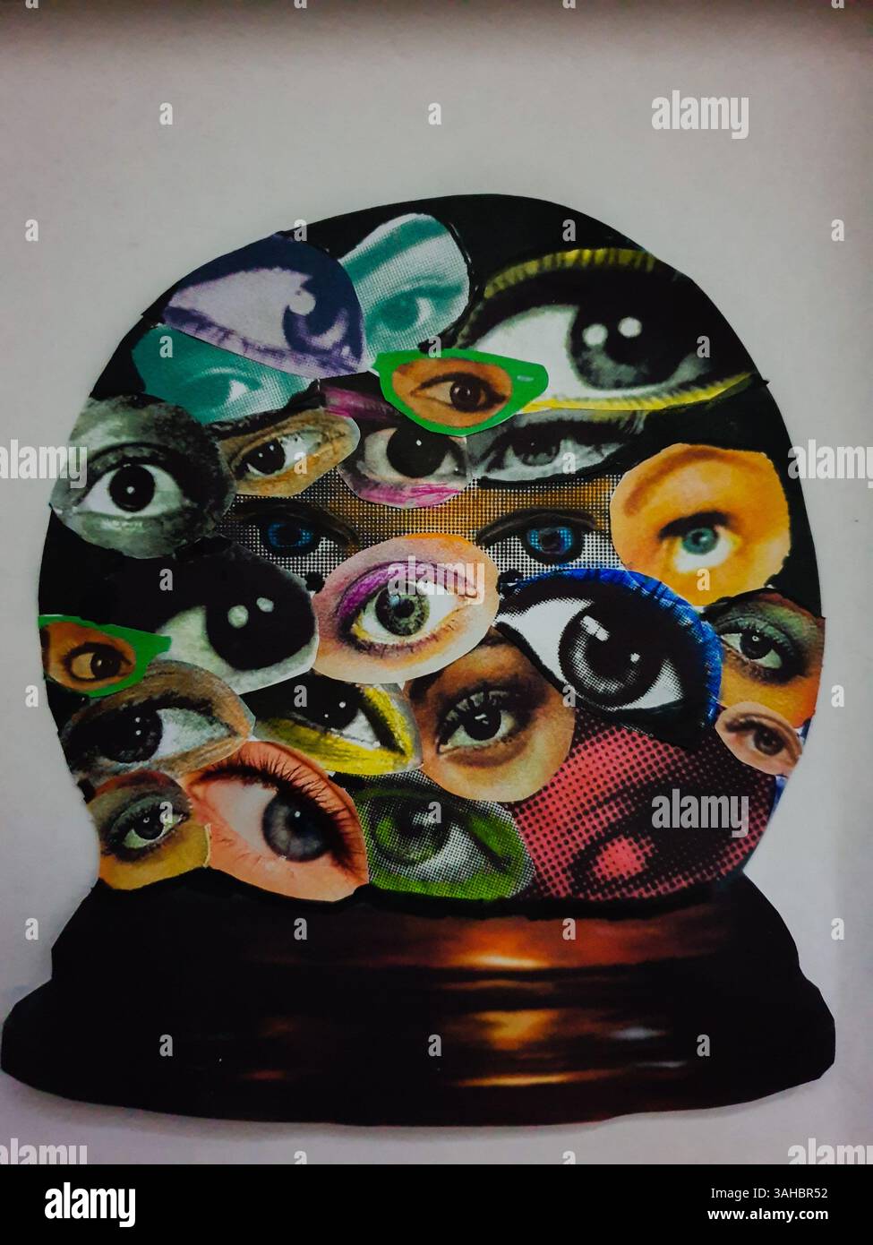 Conceptual collage art of a crystal ball full of human eyes Stock Photo ...