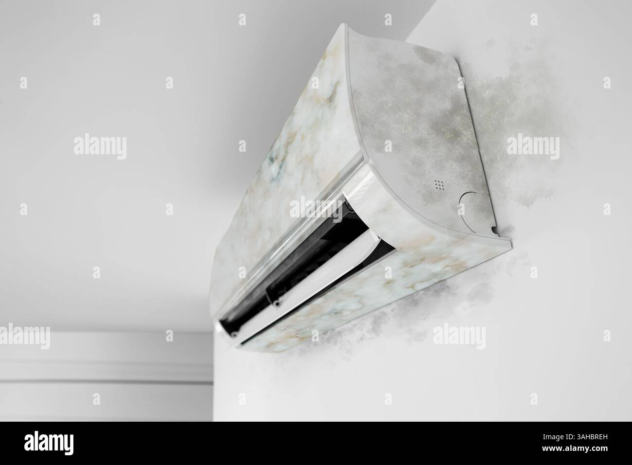 Air conditioner covered with mildew hanging on wall Stock Photo - Alamy