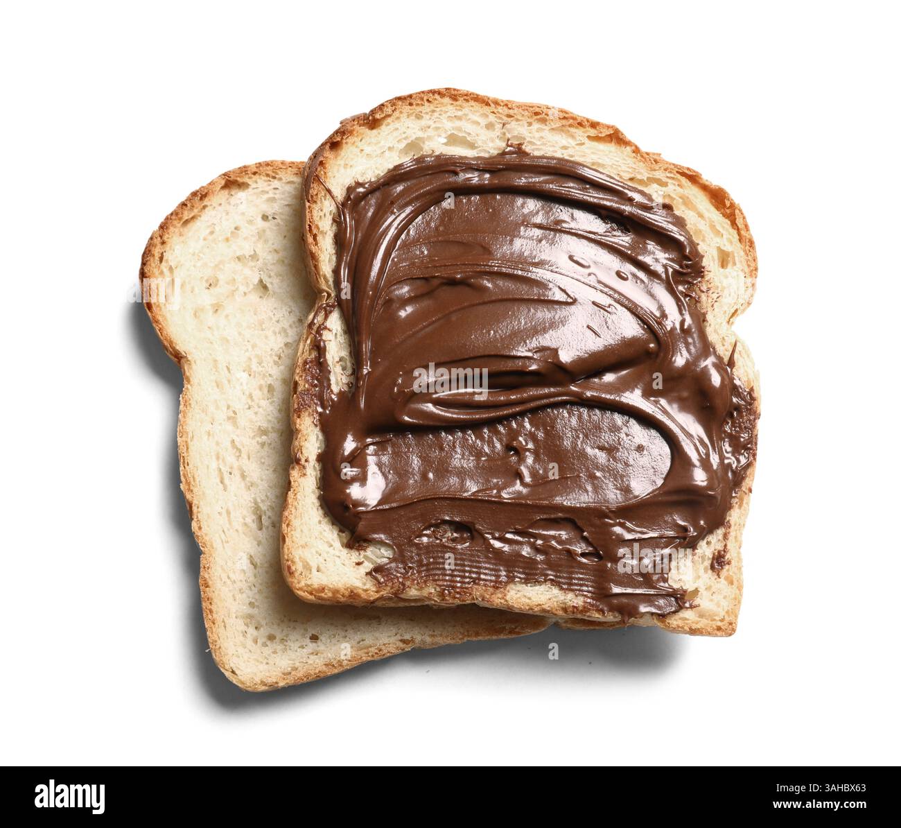Toasts with sweet chocolate spread on white background Stock Photo - Alamy