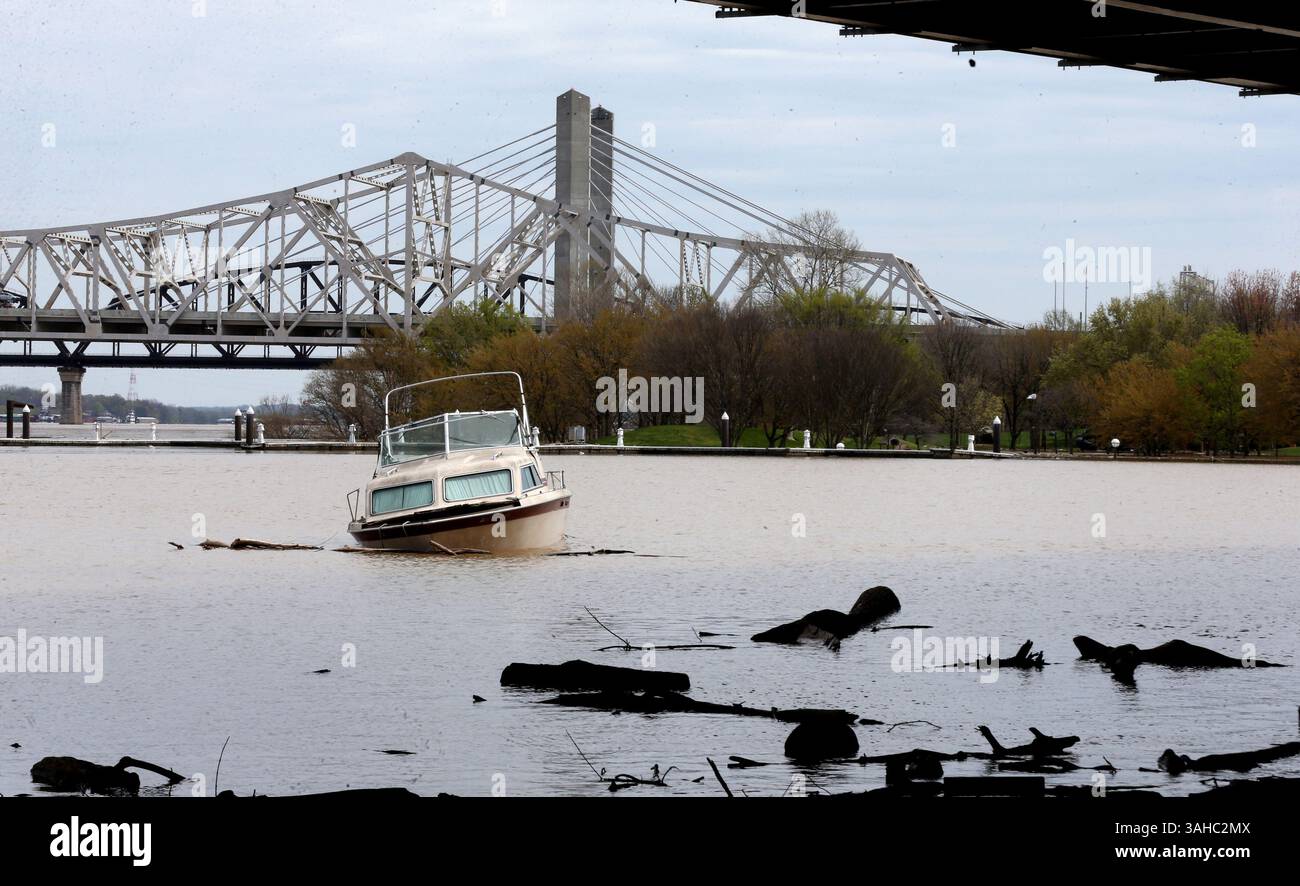 Louisville, United States. 09th Apr, 2025. A cabin cruiser and debris ...
