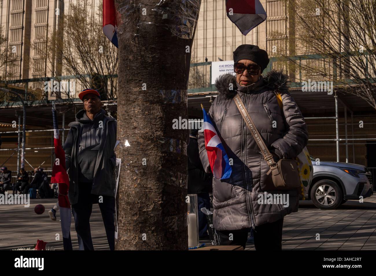 People look at a makeshift vigil for the victims of the Jet Set club ...