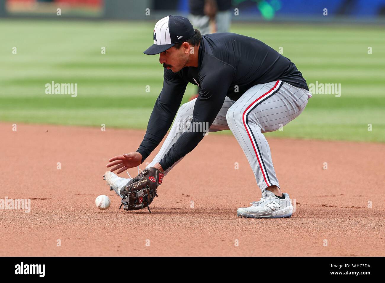 April 9, 2025: Minnesota Twins second baseman Mickey Gasper (11) warms ...