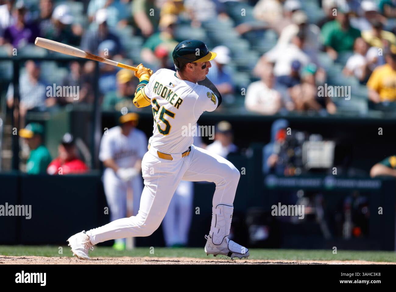 Athletics' Brent Rooker hits a single during the sixth inning of a ...