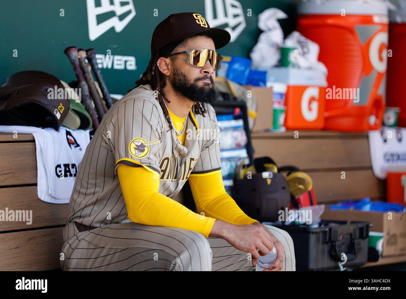 San Diego Padres' Fernando Tatis Jr. sits in the dugout during the ...