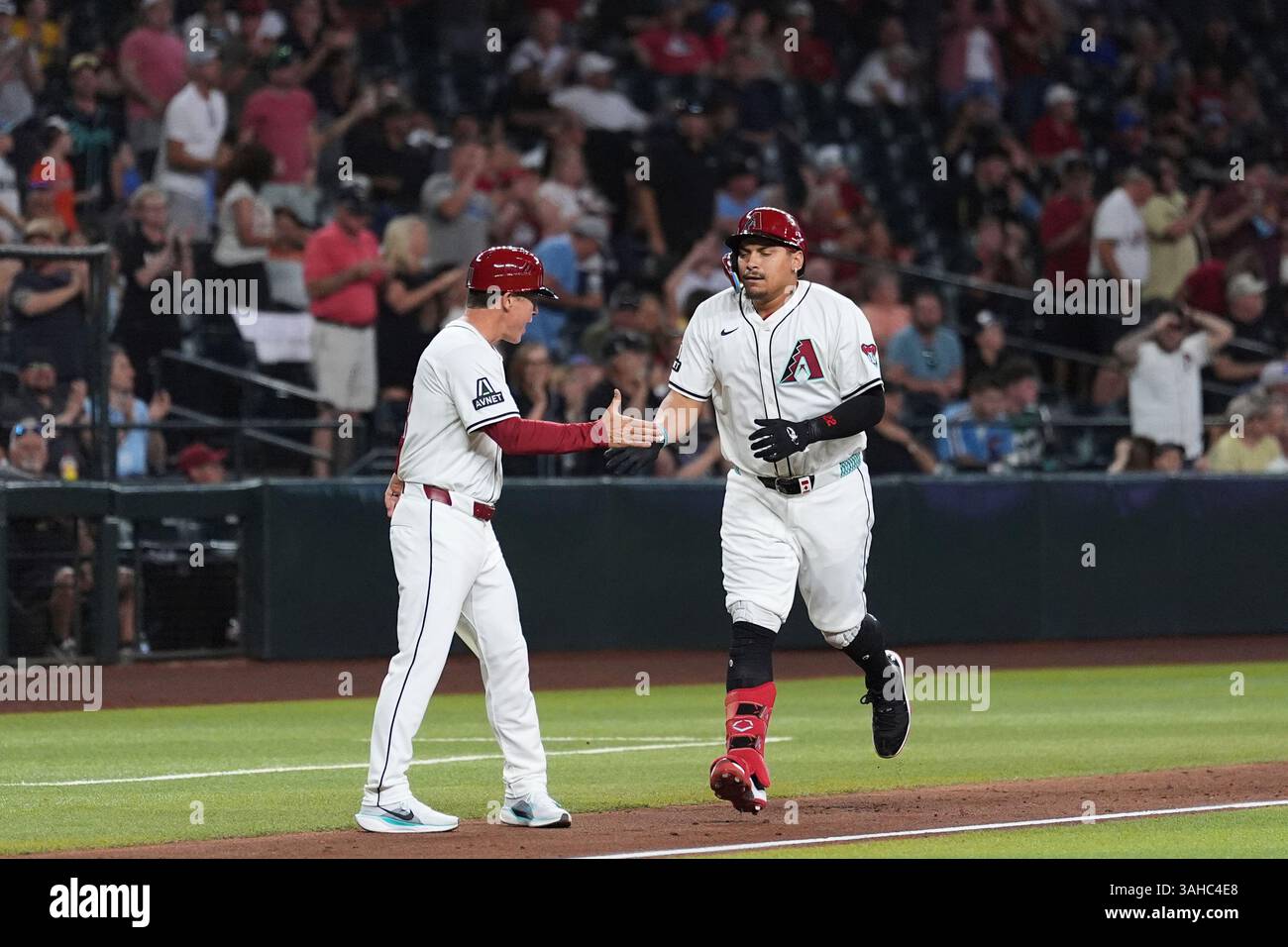 Arizona Diamondbacks' Josh Naylor, right, celebrates his home run ...