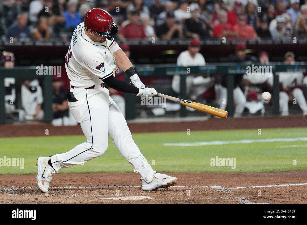 Arizona Diamondbacks' Tim Tawa connects for a two-run single against ...