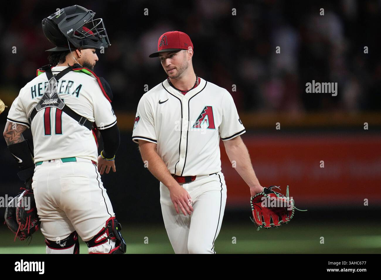 Arizona Diamondbacks pitcher Bryce Jarvis, right, celebrates a win ...