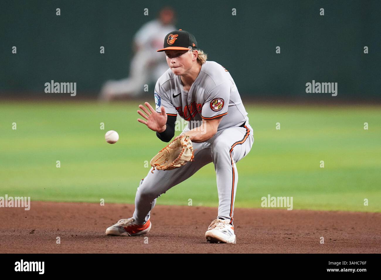 Baltimore Orioles second baseman Jackson Holliday fields a grounder hit ...