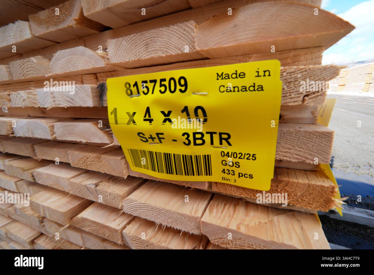 A stack of lumber awaits shipment to the United States at the Marcel ...