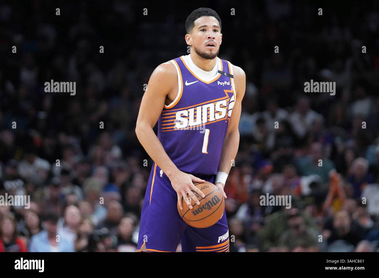 Phoenix Suns guard Devin Booker (1) during an NBA basketball game against the Golden State ...