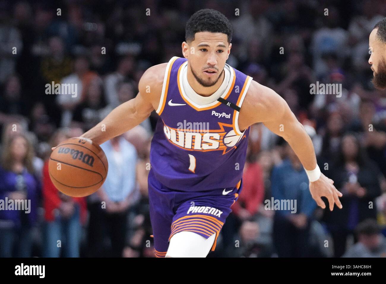 Phoenix Suns guard Devin Booker (1) during an NBA basketball game against the Golden State ...