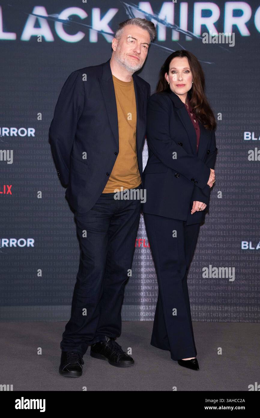 Charlie Brooker, left, and Jessica Rhoades pose for photographers upon ...