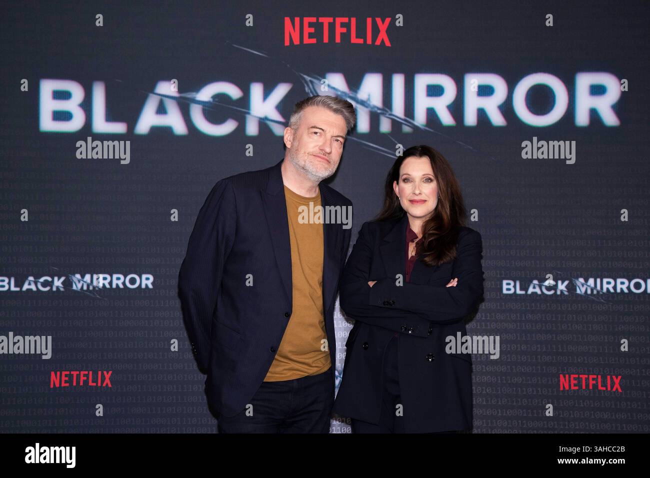 Charlie Brooker, left, and Jessica Rhoades pose for photographers upon ...