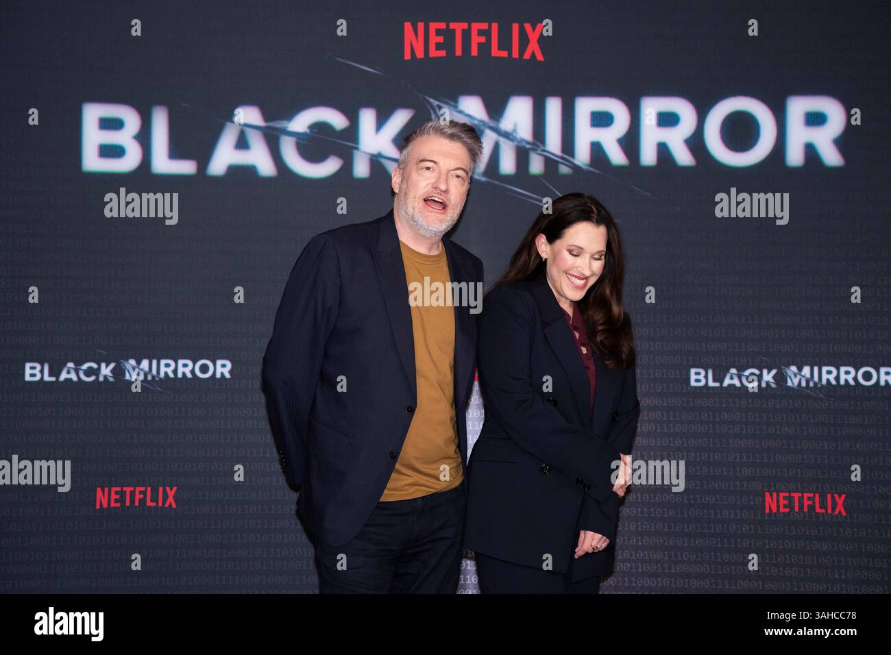 Charlie Brooker, left, and Jessica Rhoades pose for photographers upon ...