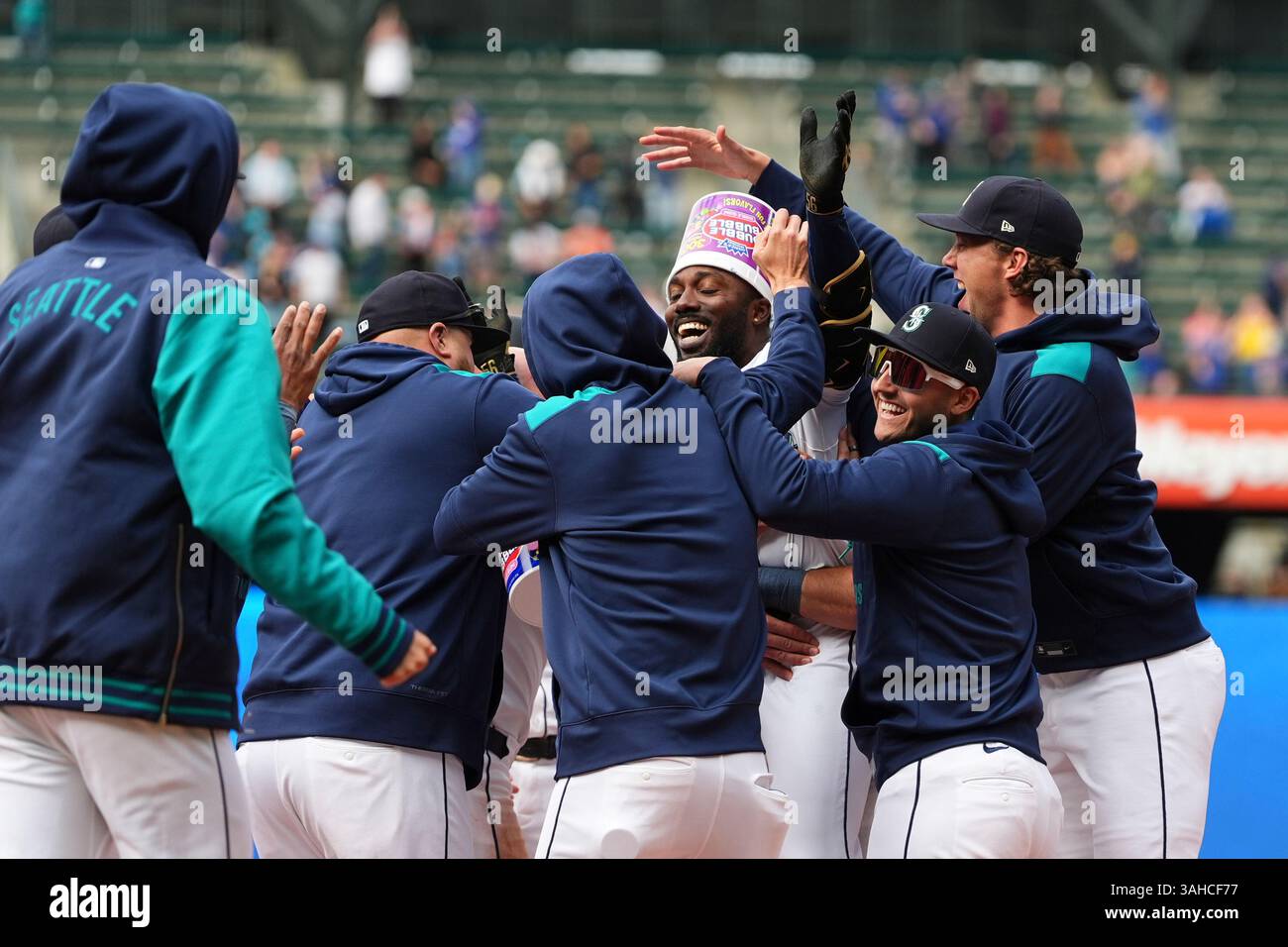 Seattle Mariners' Randy Arozarena wears a gum bucket on his head as ...