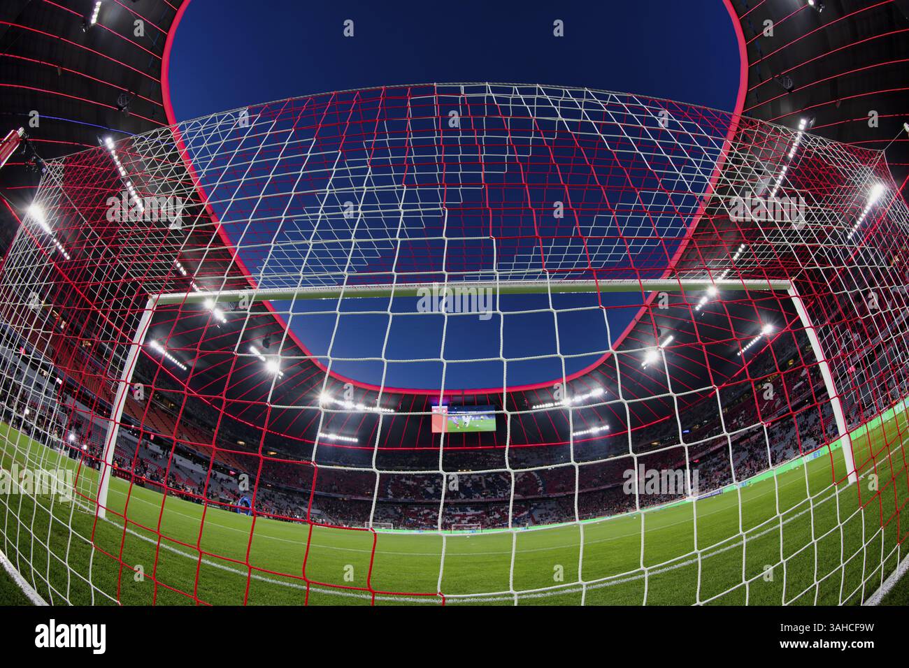 Overview, interior, floodlit match, behind-the-goal perspective, goal ...