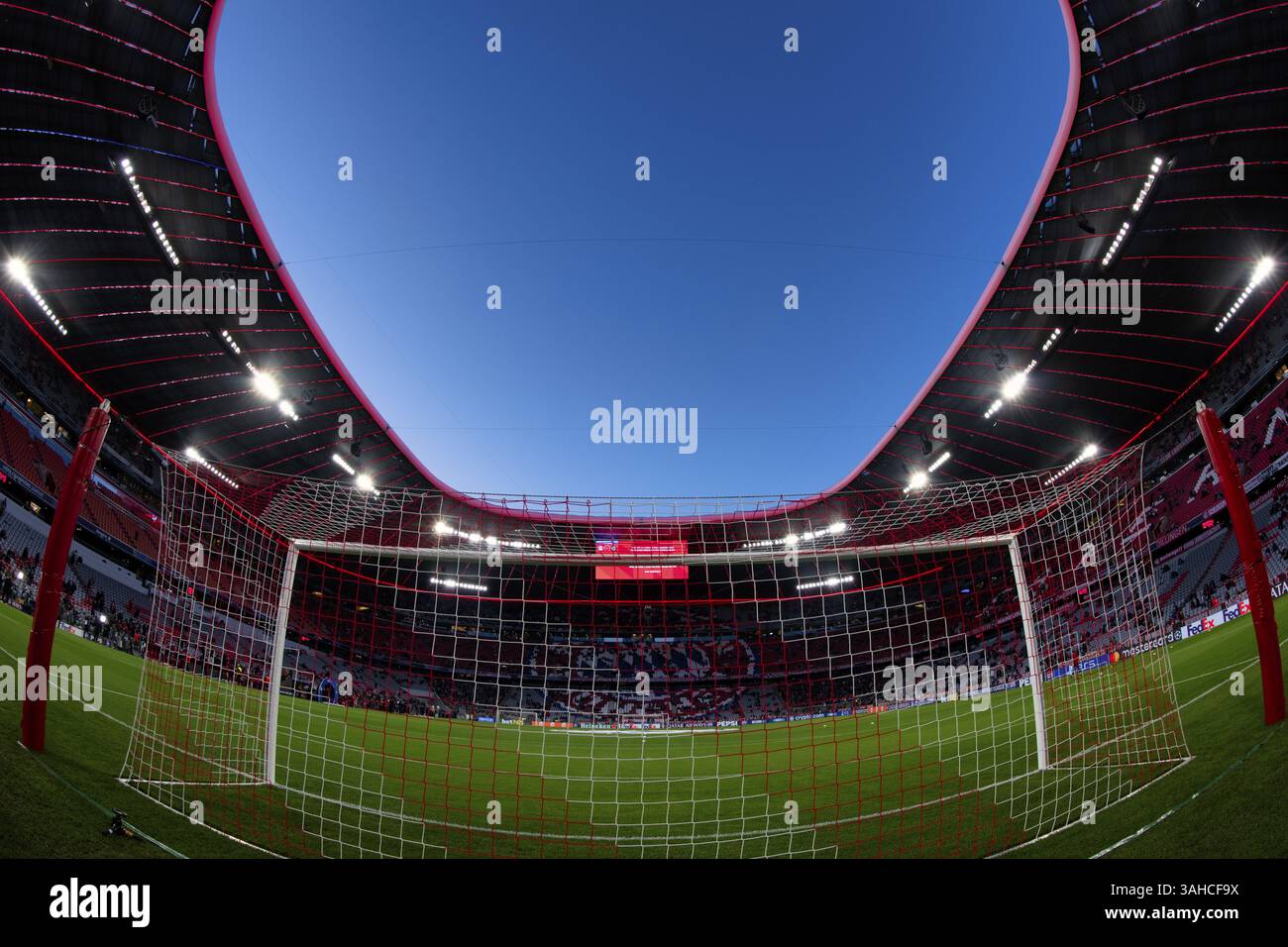 Overview, interior, floodlit match, behind-the-goal perspective, goal ...
