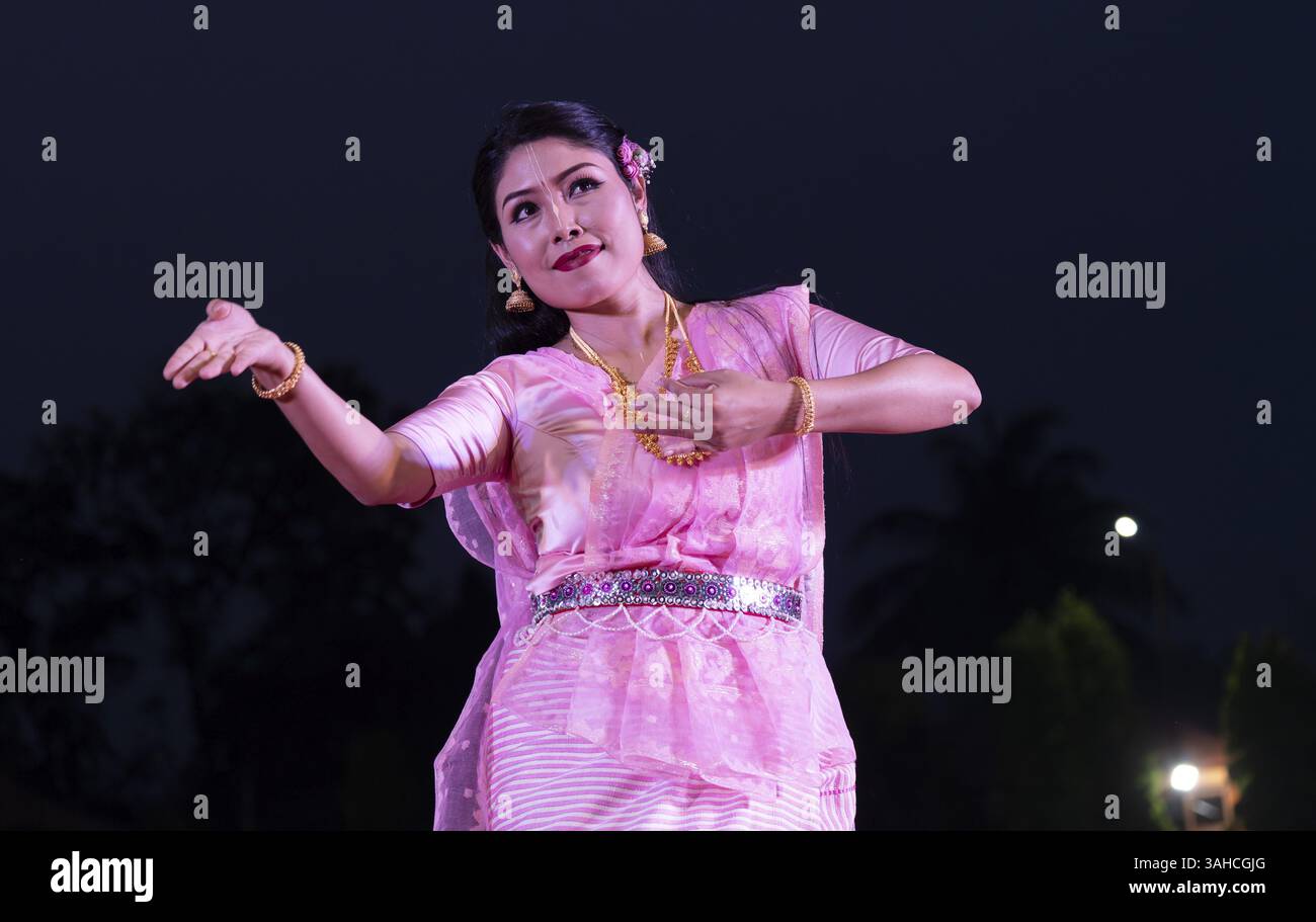 A woman performs Manipuri folk dance in an event of Bihu dance workshop, in Guwahati, India on 8 ...