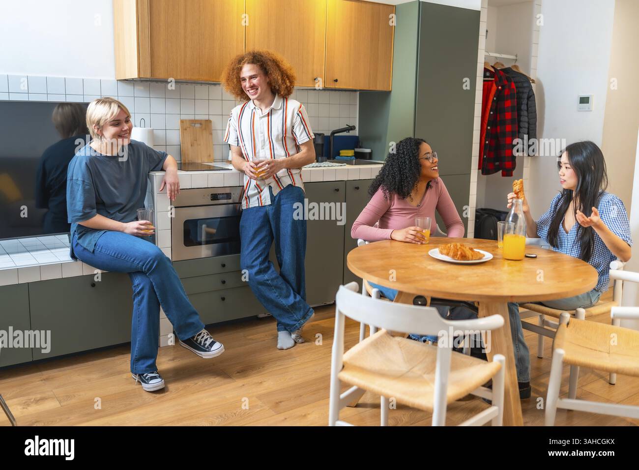 Modern multi ethnic youth joyful hi-res stock photography and images ...