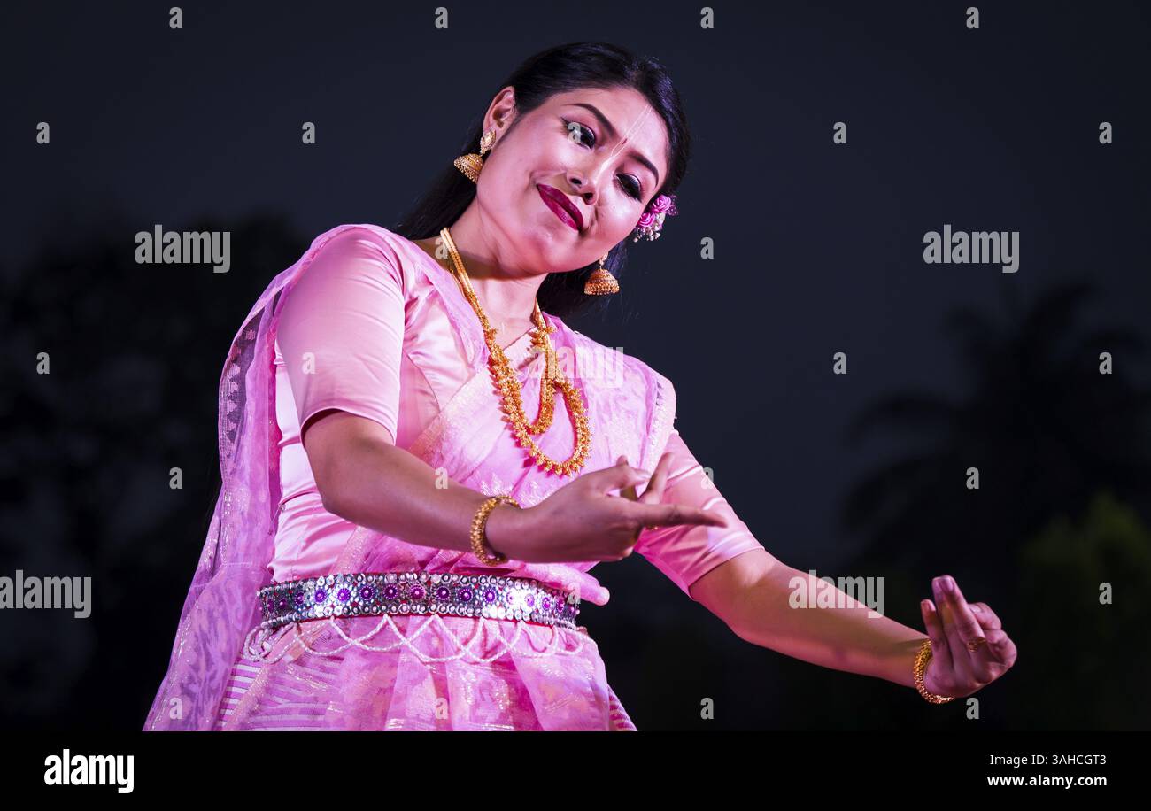 A woman performs Manipuri folk dance in an event of Bihu dance workshop ...