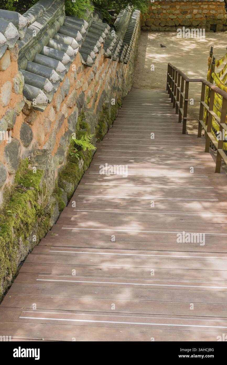 Haeinsa-gil, South Korea. Wooden wheelchair ramp alongside oriental ...