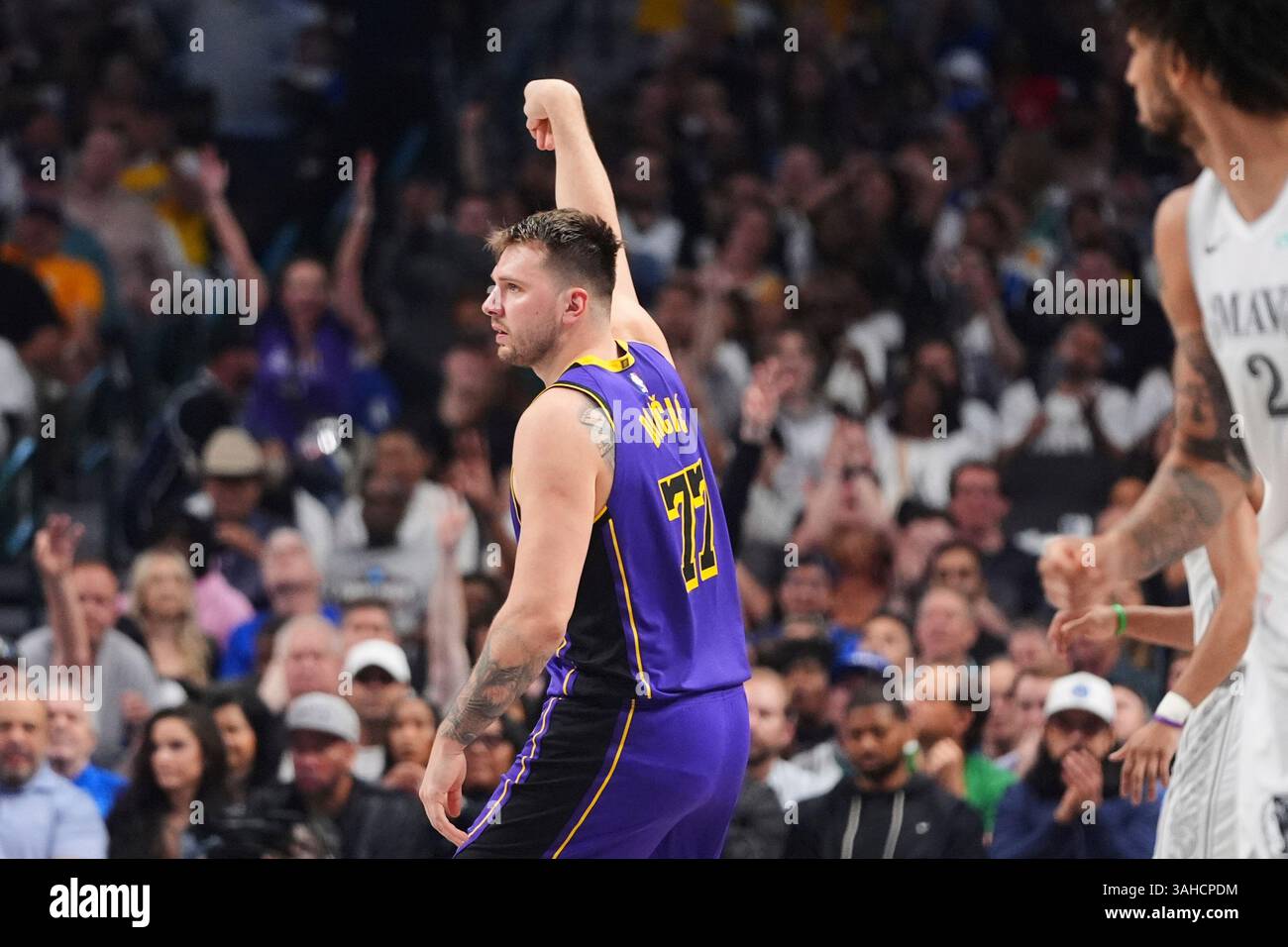 Los Angeles Lakers' Luka Doncic follows through on a shot in the first ...