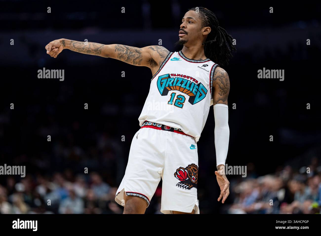 Memphis Grizzlies guard Ja Morant (12) watches his shot during the ...