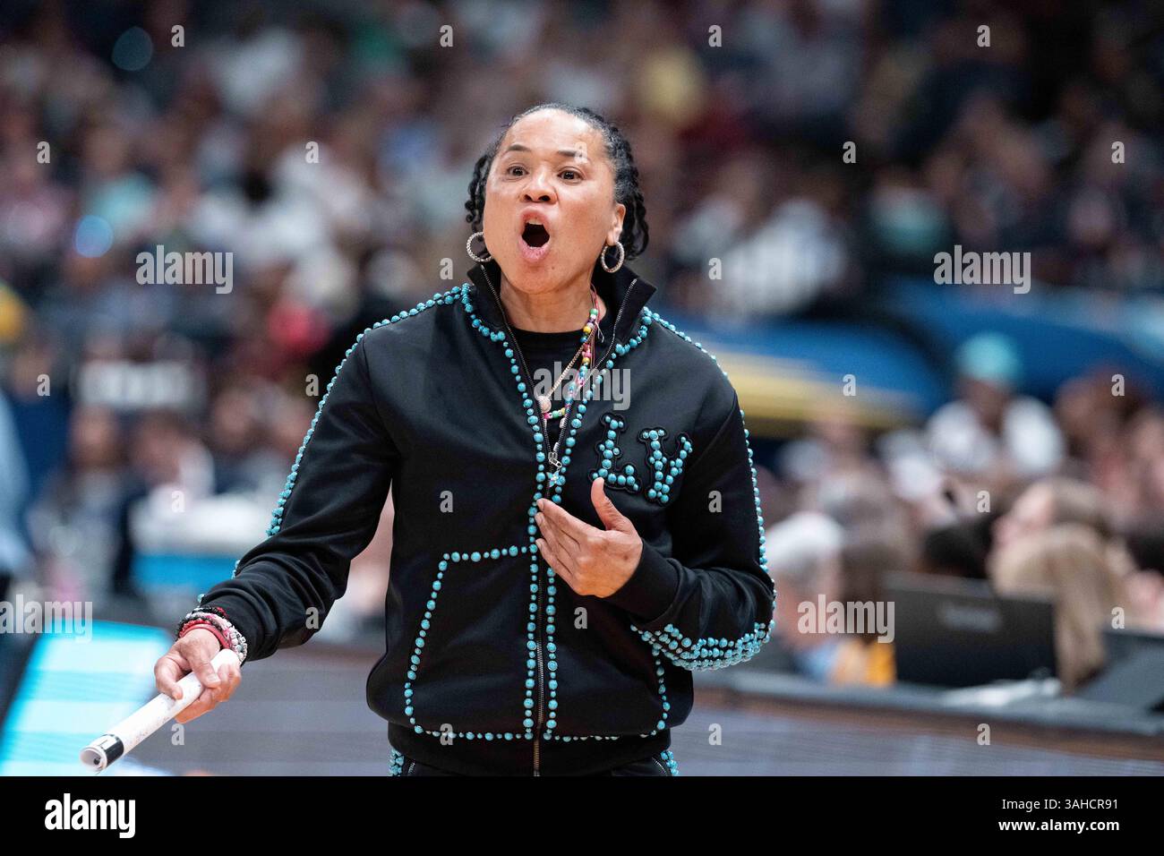 South Carolina head coach Dawn Staley yells to her players during the ...