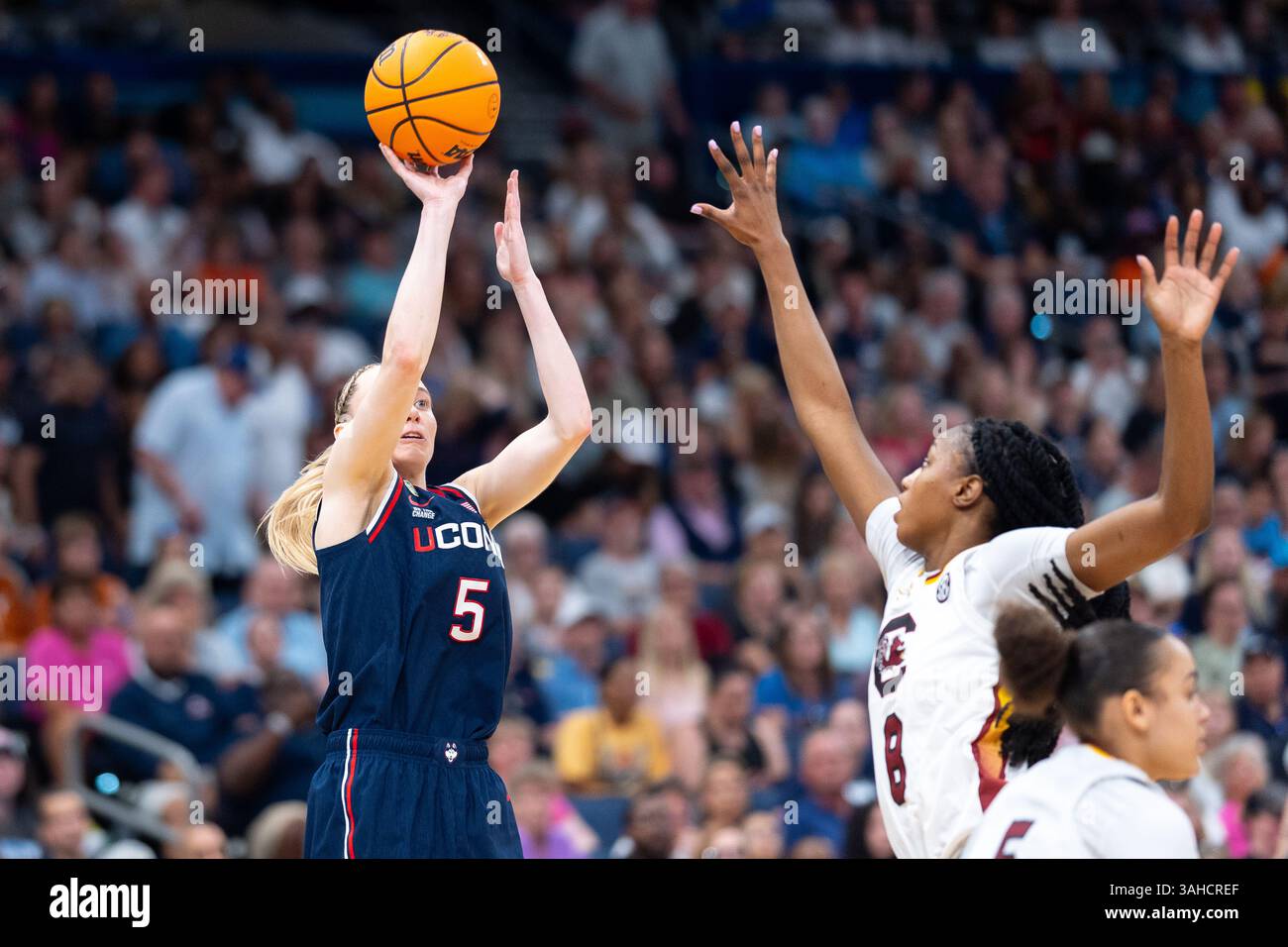 UConn guard Paige Bueckers (5) shoots over South Carolina forward Joyce Edwards (8) during the ...