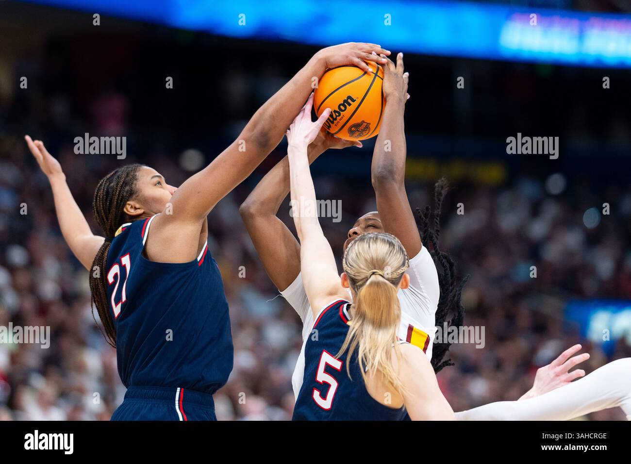UConn forward Sarah Strong (21) blocks the shot of South Carolina ...