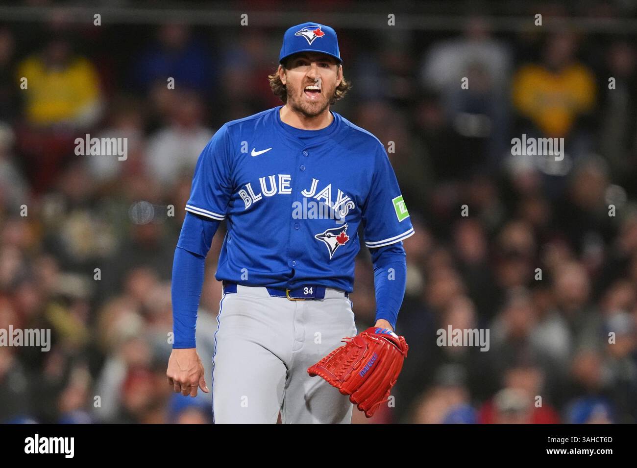 Toronto Blue Jays pitcher Kevin Gausman cheers on his teammates after ...