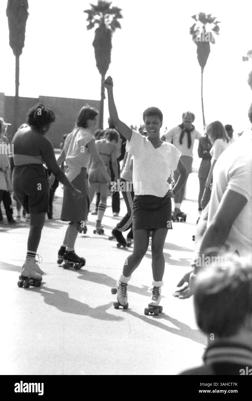 Los Angeles, CA, USA, approx. 1985. People roller skating at Venice ...