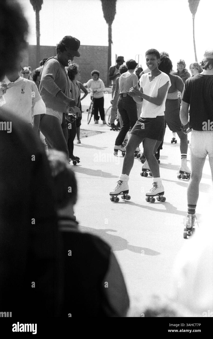 Los Angeles, CA, USA, approx. 1985. People roller skating at Venice ...