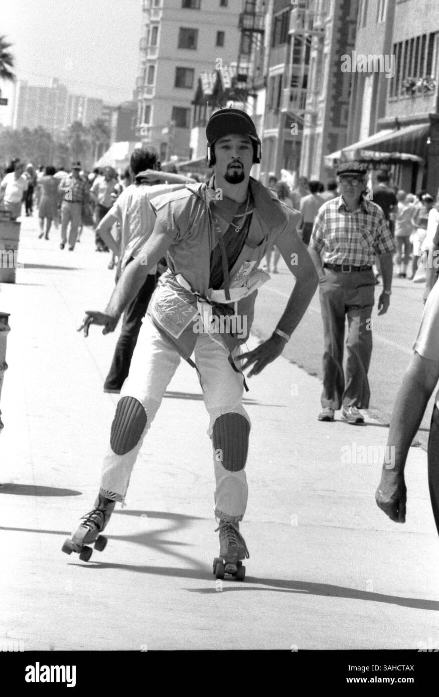 Los Angeles, CA, USA, approx. 1985. People roller skating at Venice ...