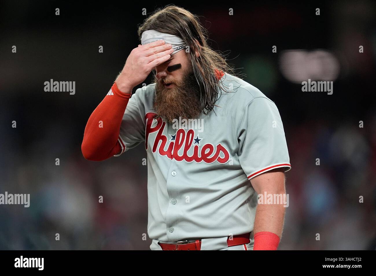 Philadelphia Phillies outfielder Brandon Marsh reacts to play against ...