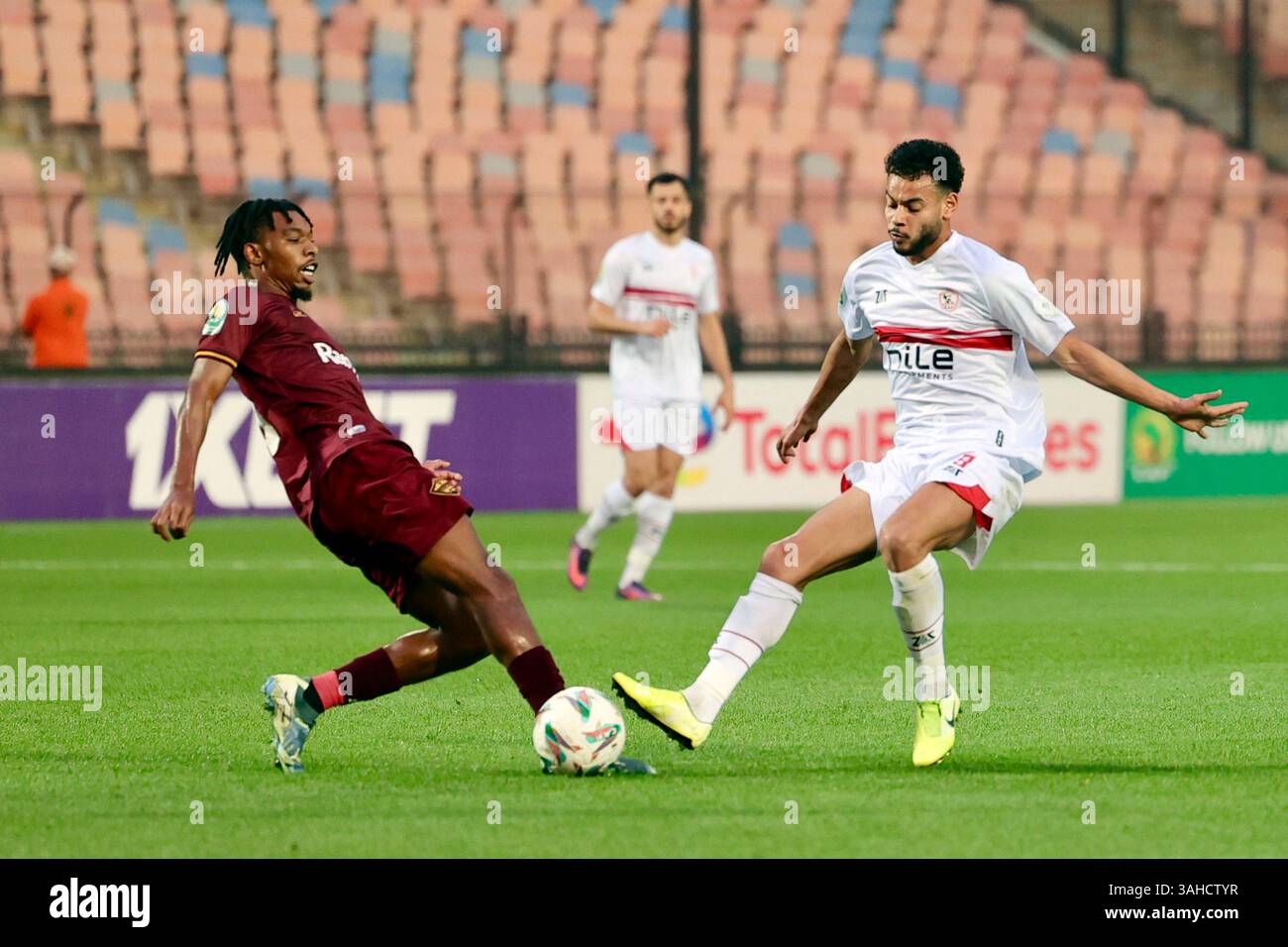 Cairo, Egypt. 9th Apr, 2025. Nabil Emad (R) of Zamalek vies for the ...