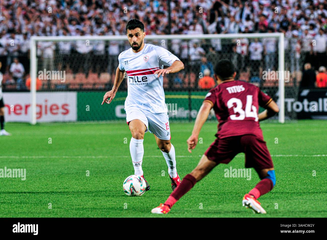 Cairo, Egypt. 9th Apr, 2025. Abdallah El Said (L) of Zamalek breaks ...
