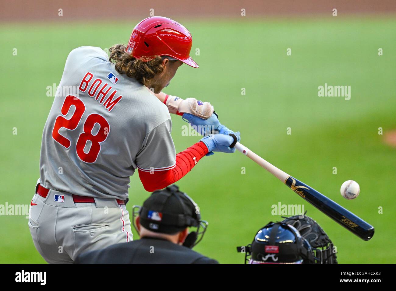 ATLANTA, GA – APRIL 09: Philadelphia third base Alec Bohm (28) swings ...