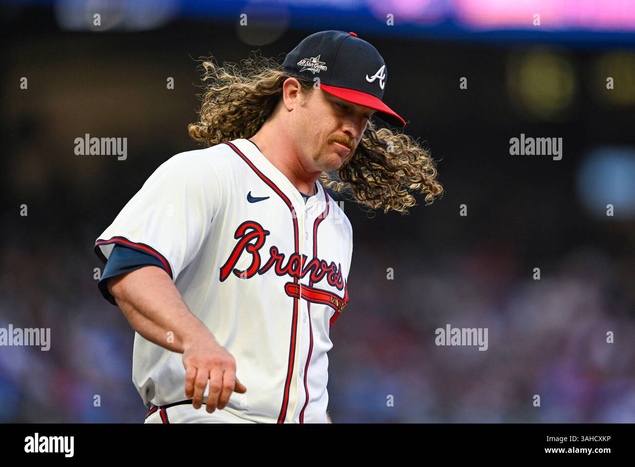 ATLANTA, GA – APRIL 09: Atlanta pitcher Grant Holmes (66) covers first ...