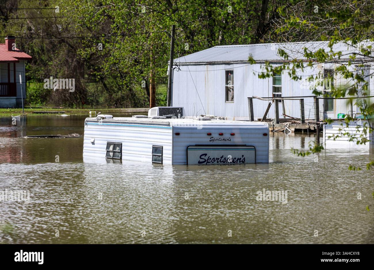 An RV is flooded from high water from the Green River, Wednesday, April ...