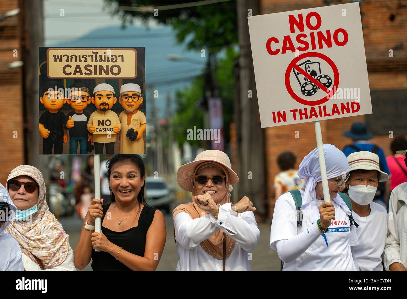 Protesters seen holding placards during a demonstration to protest the ...