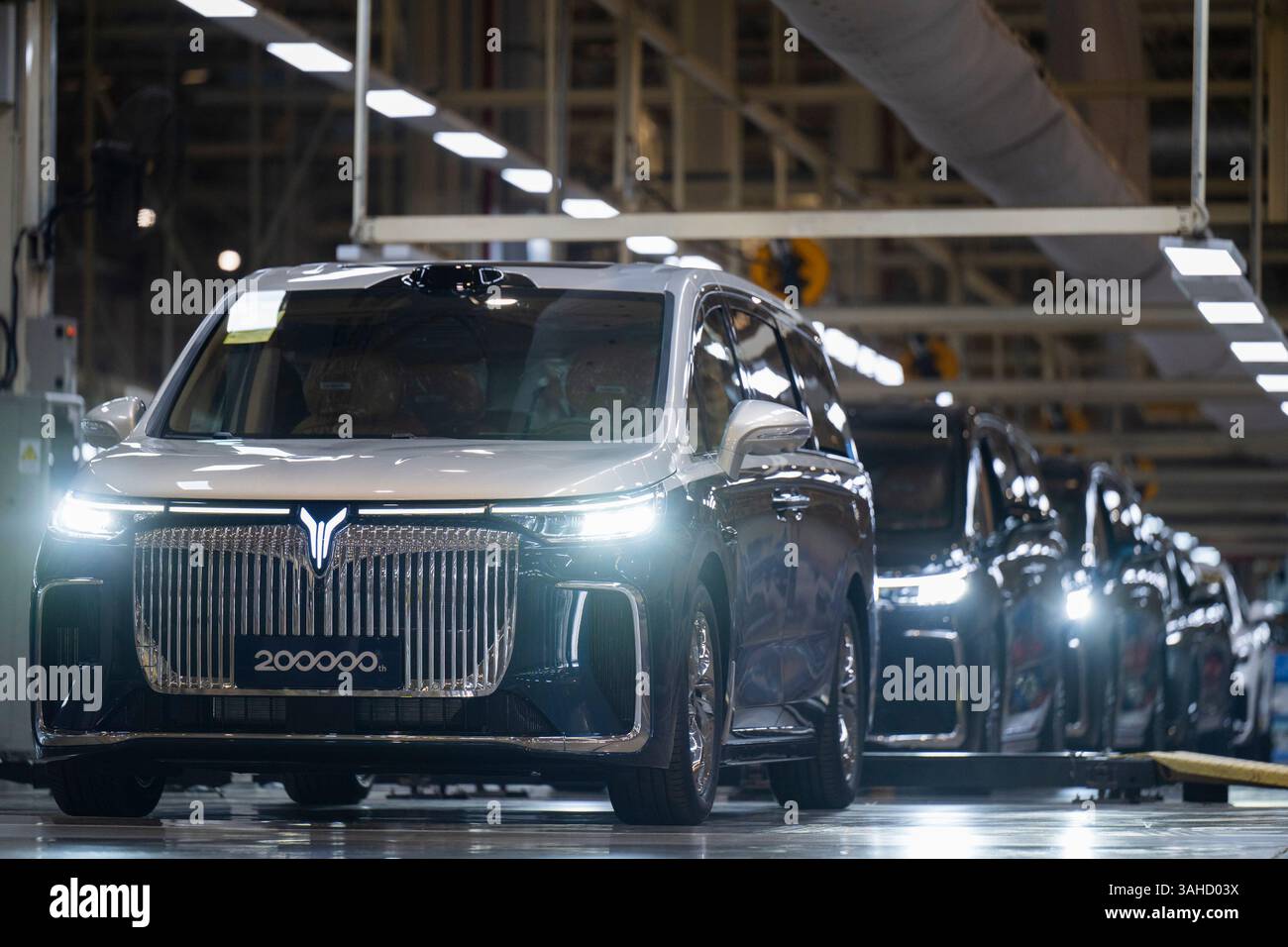 Beijing, China's Hubei Province. 9th Apr, 2025. The 200,000th vehicle ...